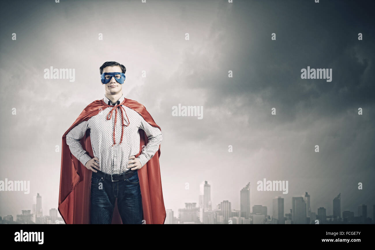 Young confident superman in mask and cape Stock Photo - Alamy