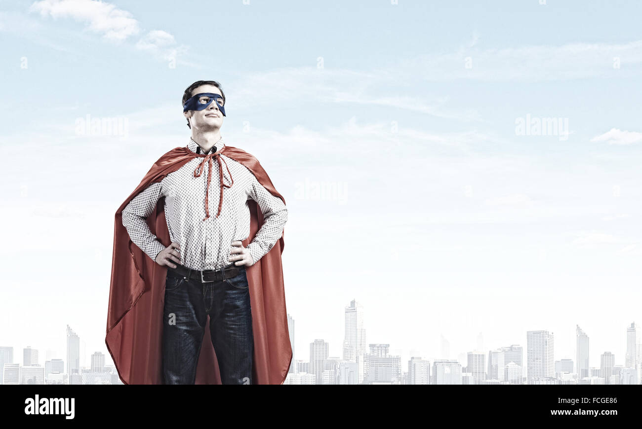Young confident superman in mask and cape Stock Photo - Alamy