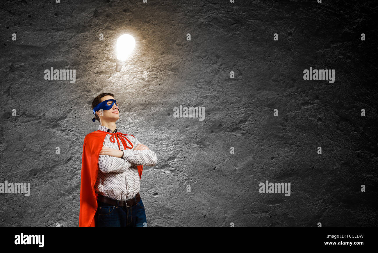 Young confident superman in mask and cape Stock Photo - Alamy