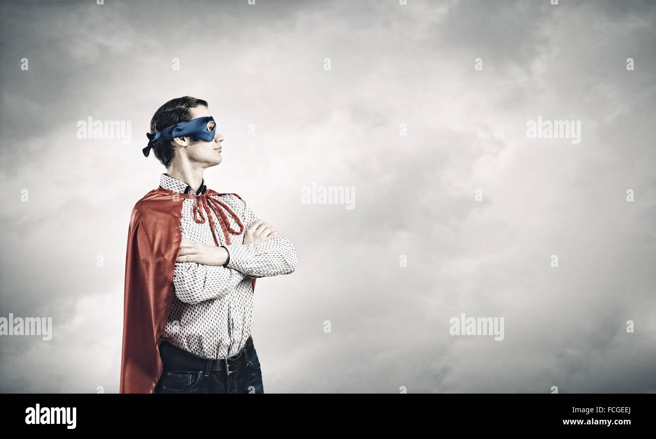 Young confident superman in mask and cape Stock Photo - Alamy