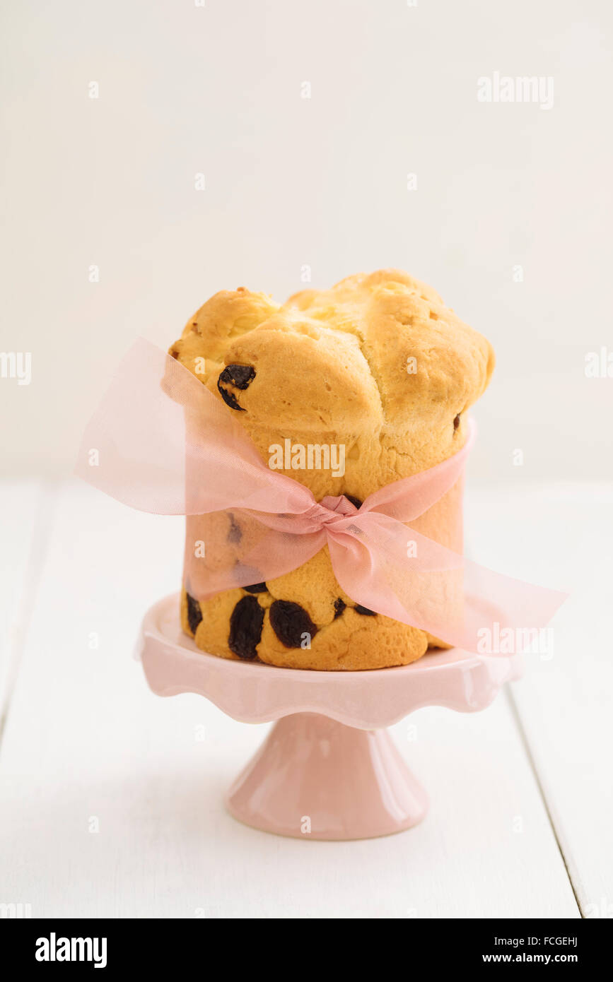 Home-baked mini panettone on pink cake stand Stock Photo - Alamy