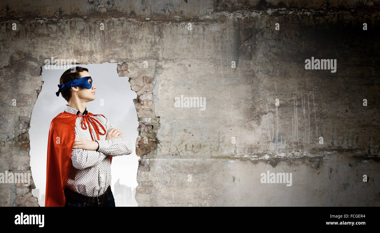 Young confident superman in mask and cape Stock Photo - Alamy
