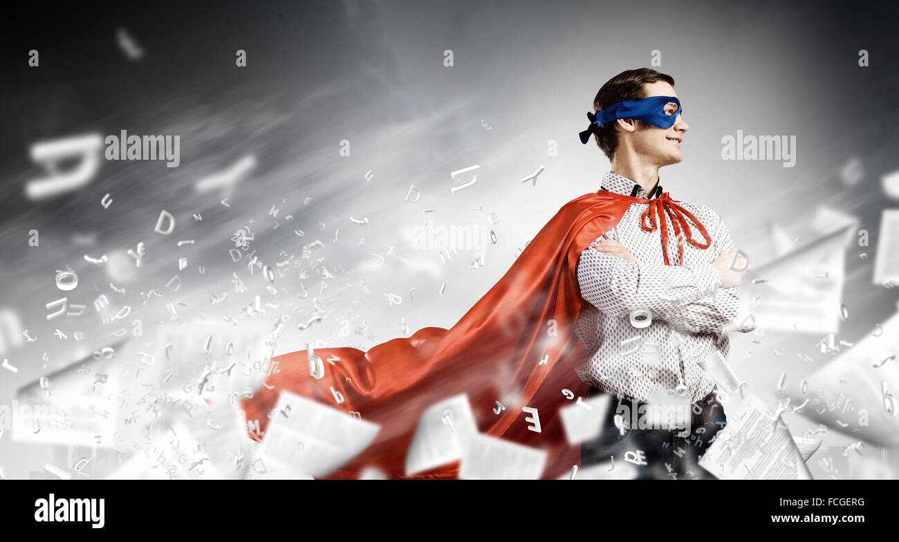 Young confident superman in mask and cape Stock Photo - Alamy