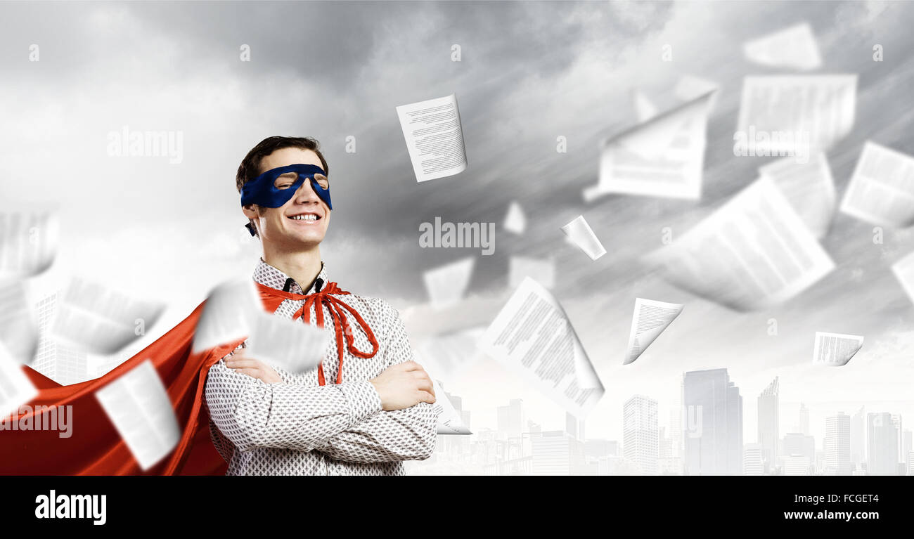 Young confident superman in mask and cape Stock Photo - Alamy