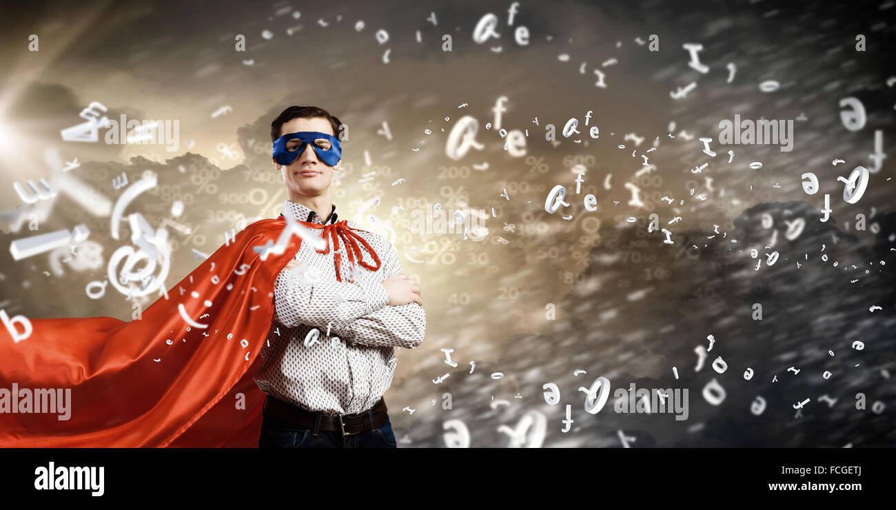 Young confident superman in mask and cape Stock Photo - Alamy
