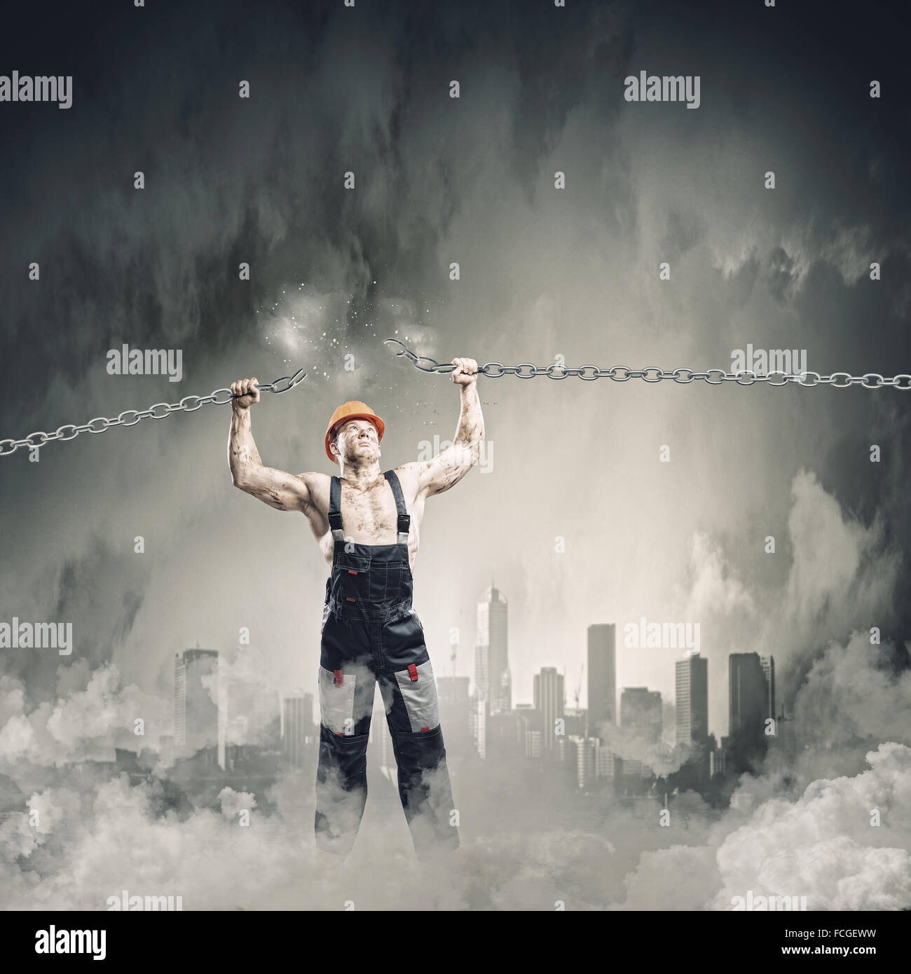 Strong man in uniform tearing metal chain with hands Stock Photo - Alamy