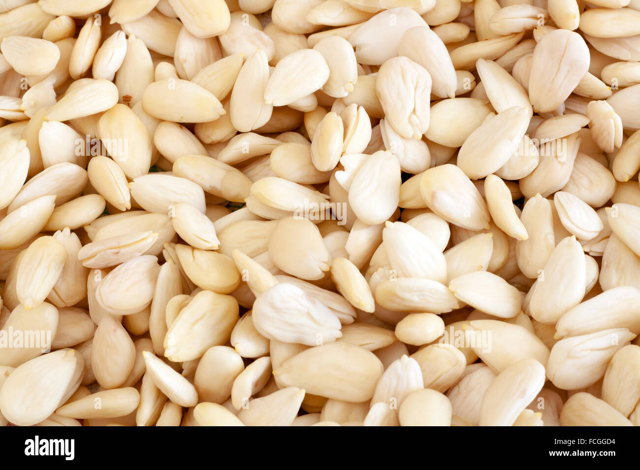 Close-up image of peeled (blanched) almonds Stock Photo - Alamy