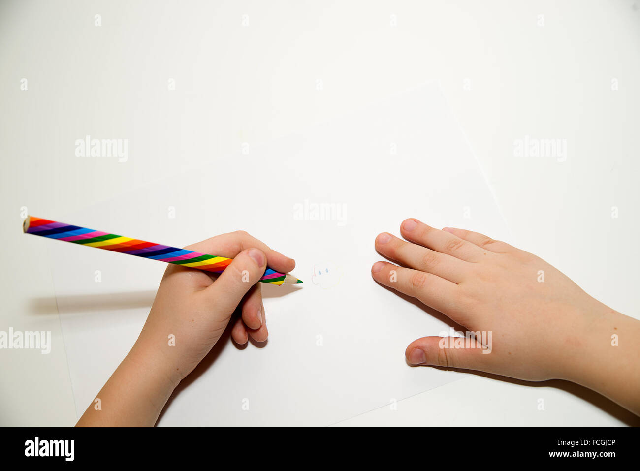 Kids hand holding pencil hi-res stock photography and images - Alamy
