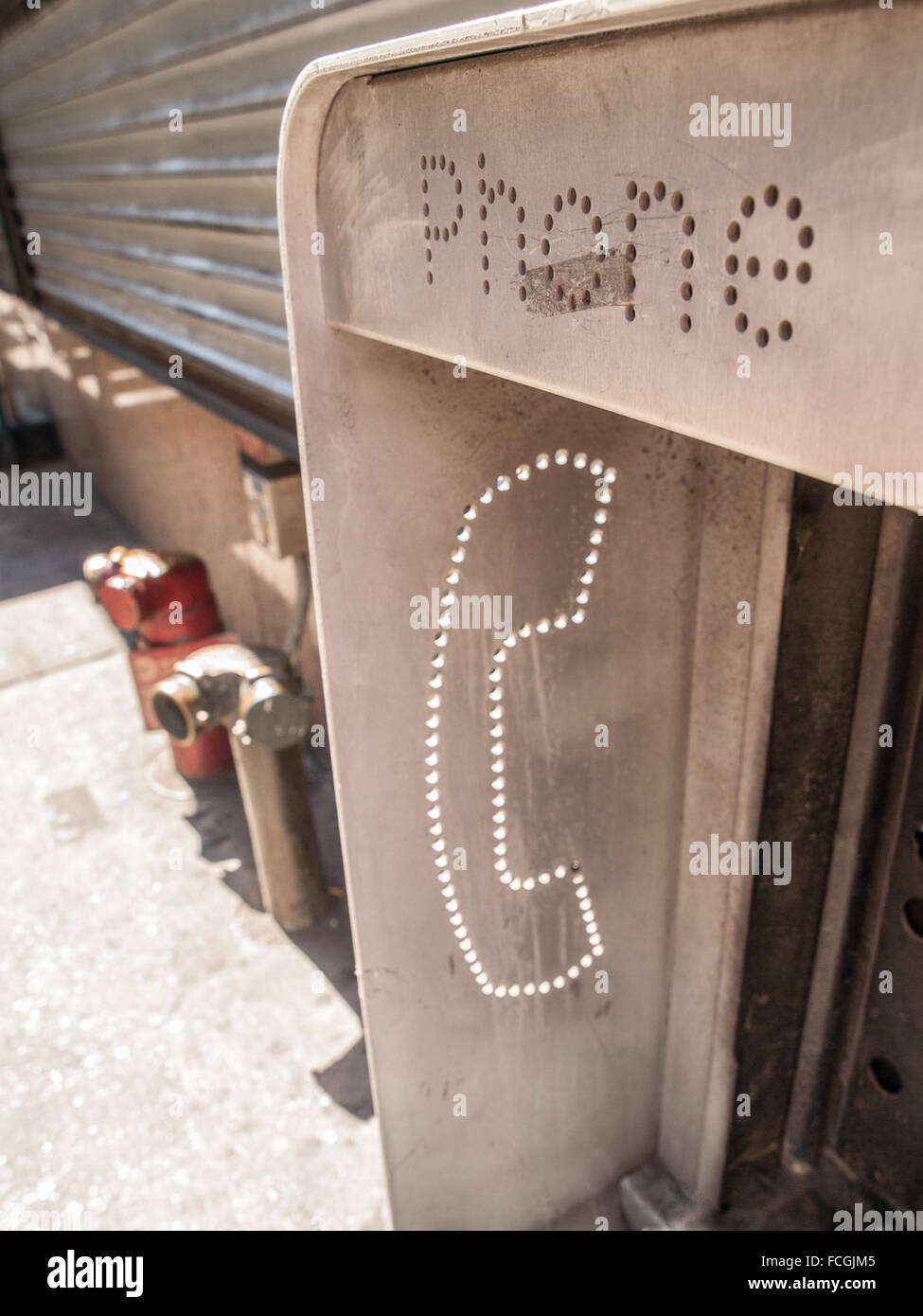 Dirty abandoned metal phone booth in Manhattan, New York City, USA ...