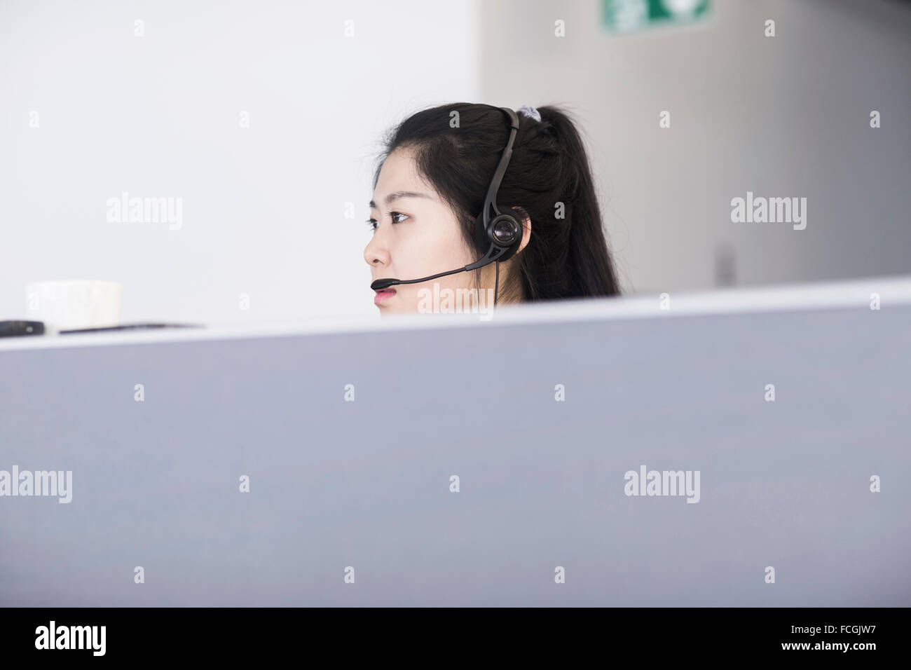 Chinese office worker working in corporate business Stock Photo - Alamy