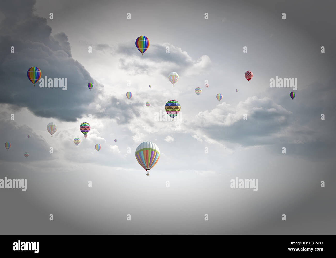 Colorful balloons flying high in grey sky Stock Photo - Alamy