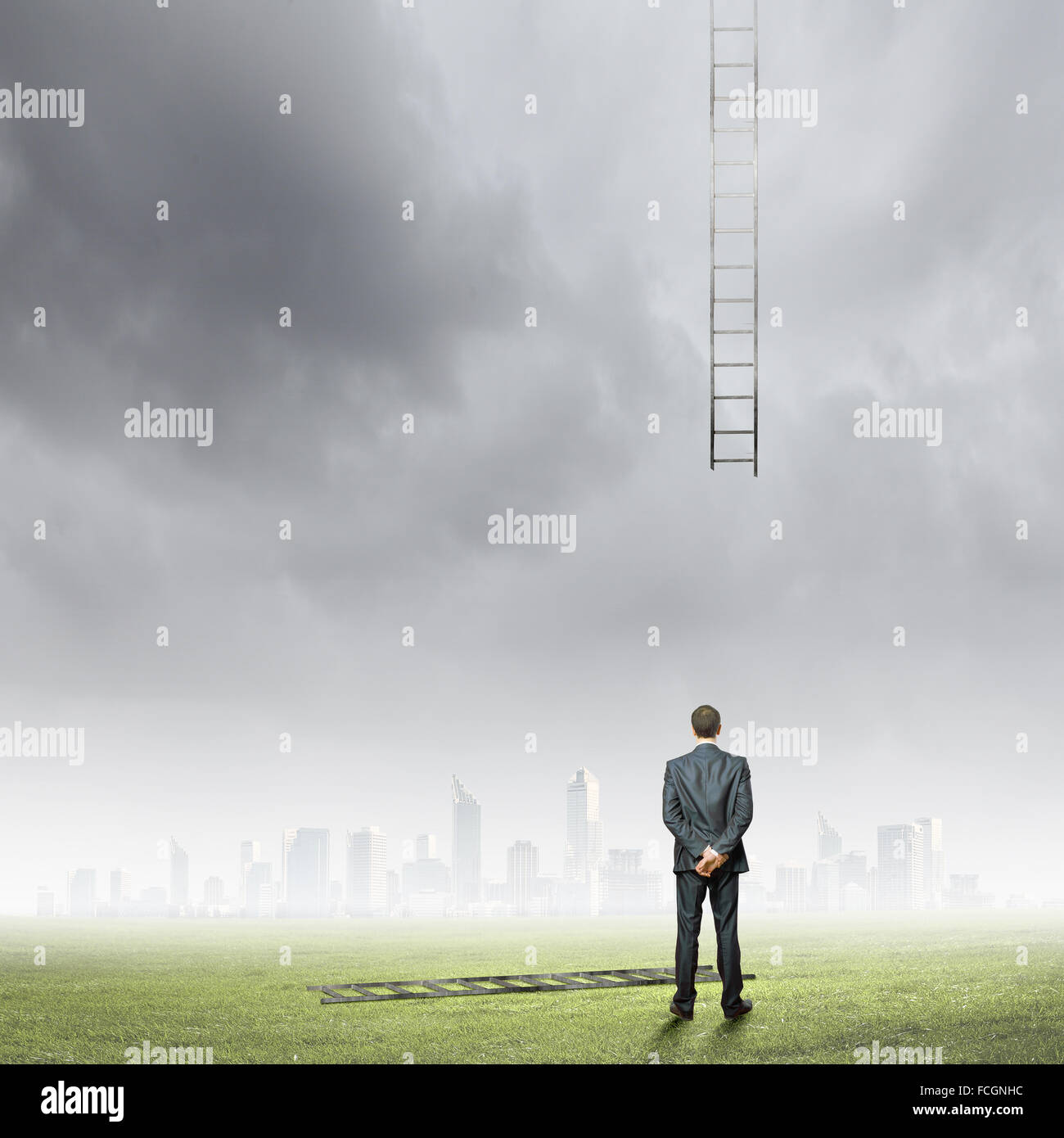 Rear view of businessman looking at broken ladder Stock Photo - Alamy