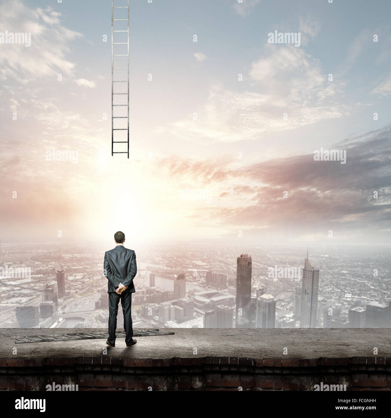 Rear view of businessman looking at broken ladder Stock Photo - Alamy