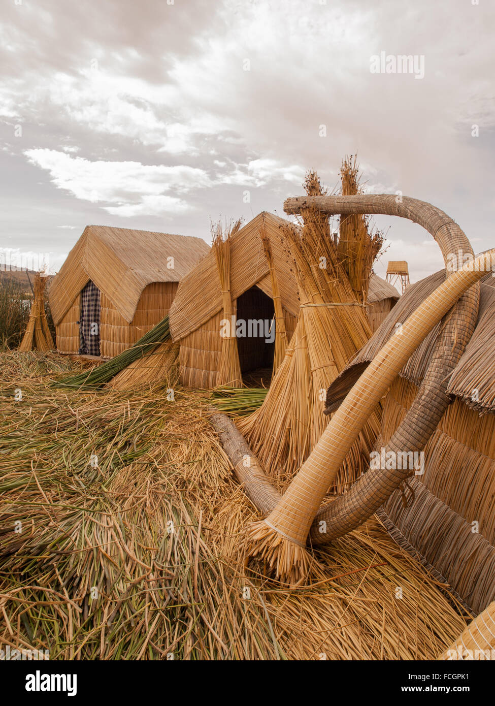 Straw huts on floating island, Lake Titicaca, Peru Stock Photo - Alamy