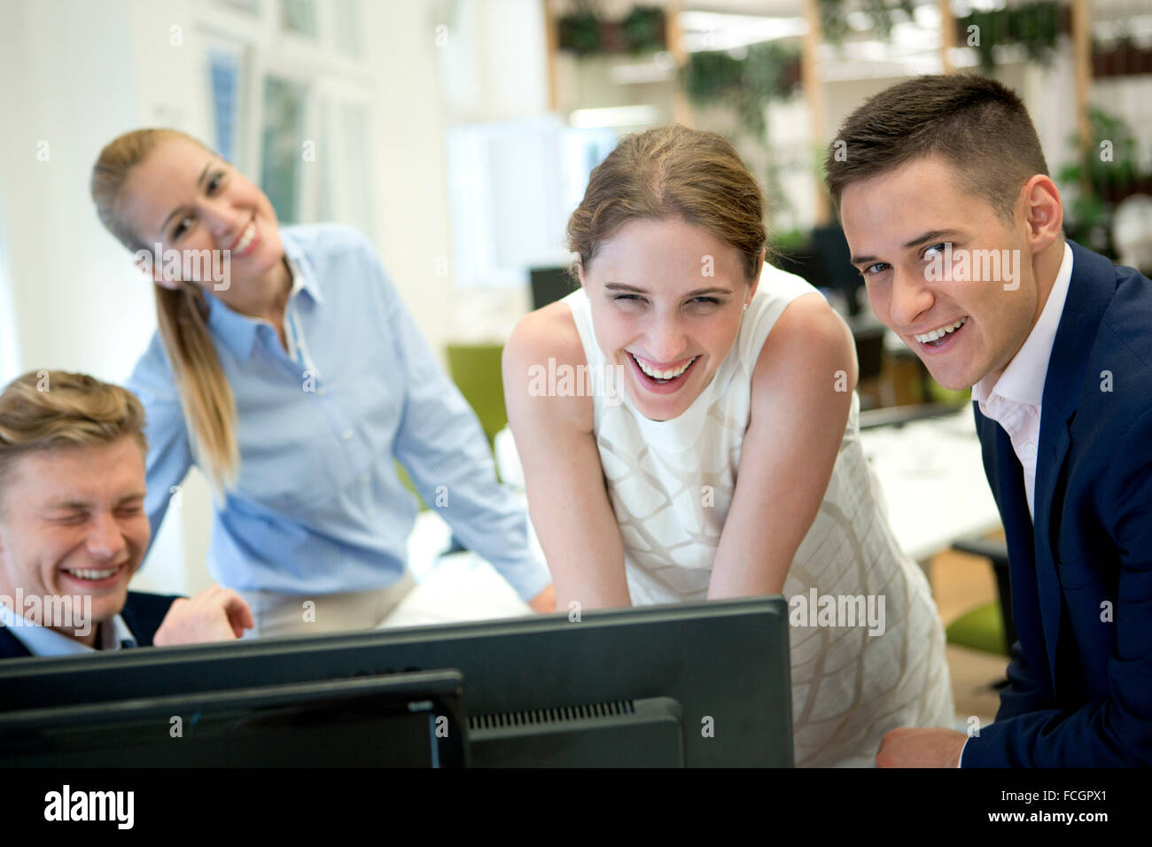 Happy business team in hi-res stock photography and images - Alamy
