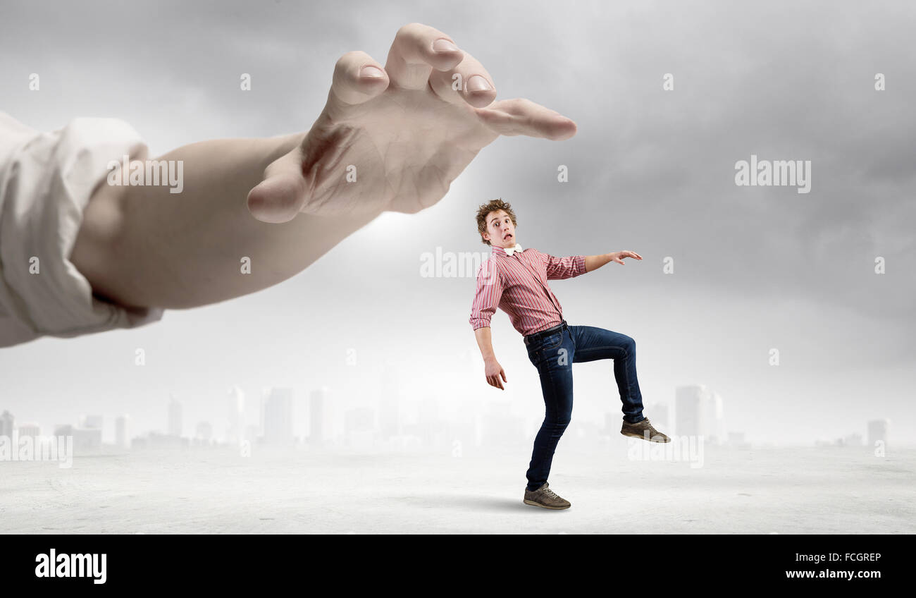 Man running away scared looking hi-res stock photography and images - Alamy