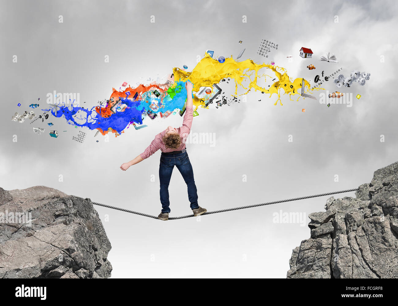 Young man in casual evading from flying icons Stock Photo - Alamy