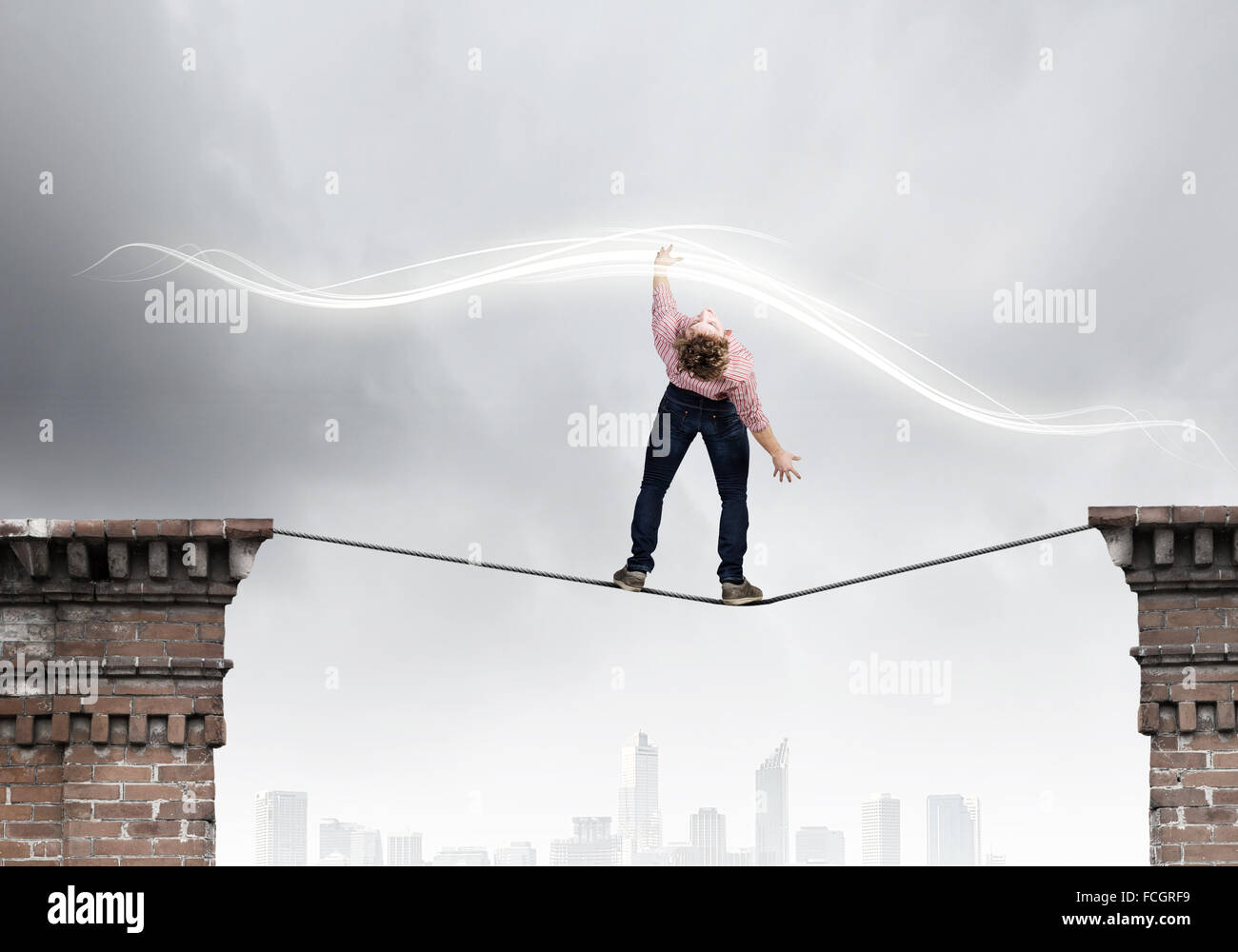 Young man in casual evading from flying icons Stock Photo - Alamy