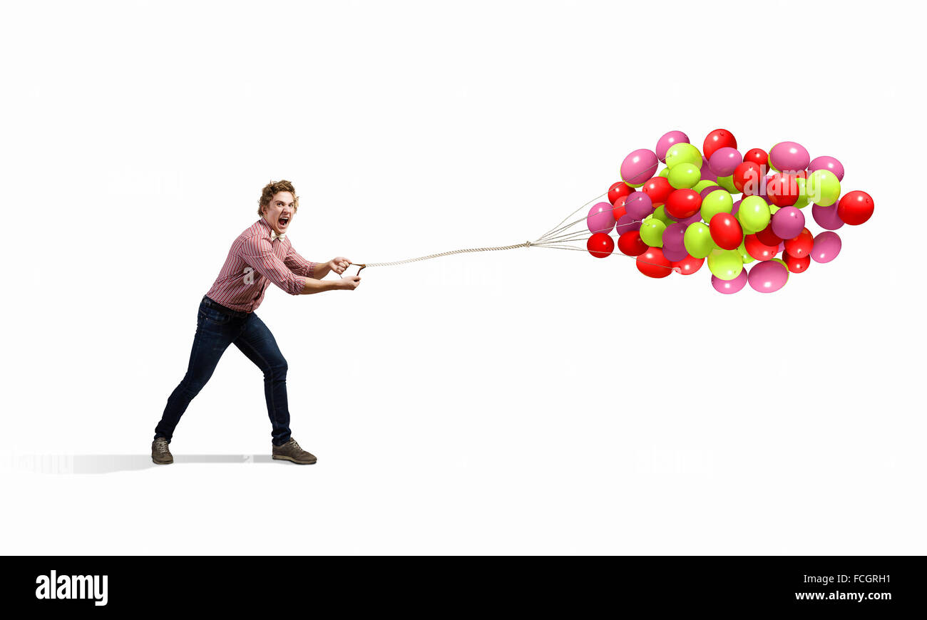 Carefree man balloons hi-res stock photography and images - Alamy