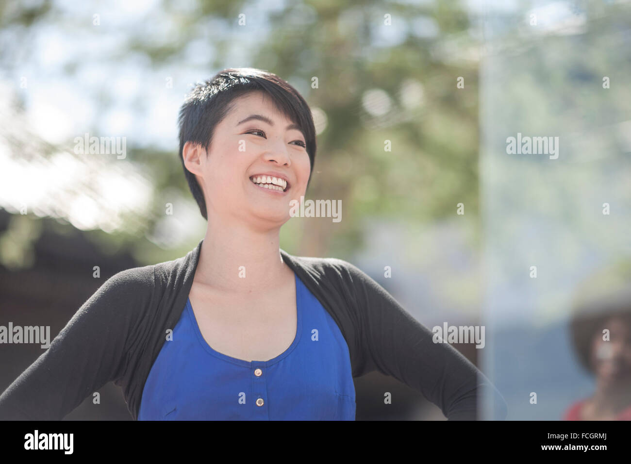 Portrait of a Chinese woman smiling happily Stock Photo - Alamy