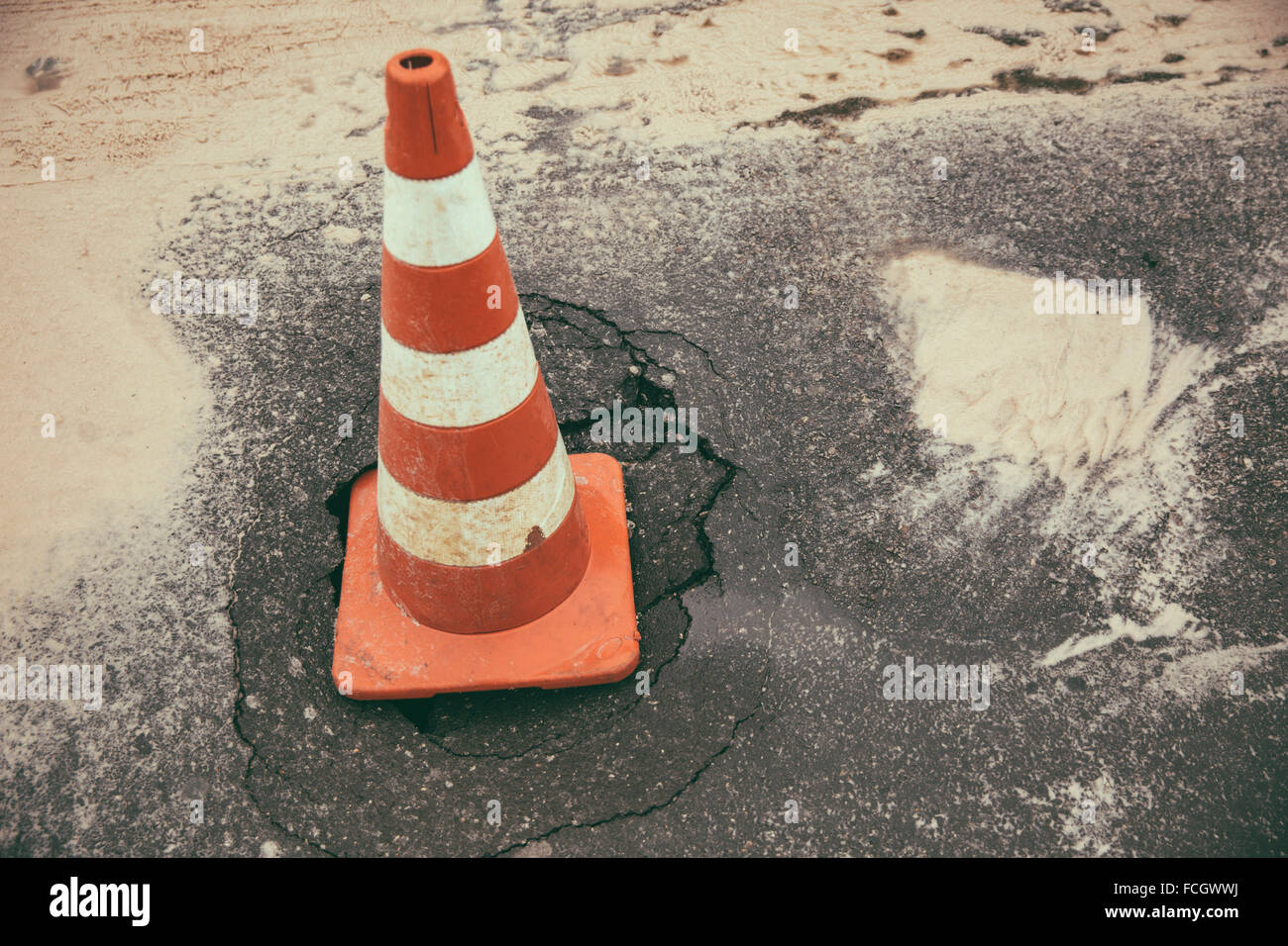 Brazil Florianopolis traffic cone on broken tarmac after heavy ...