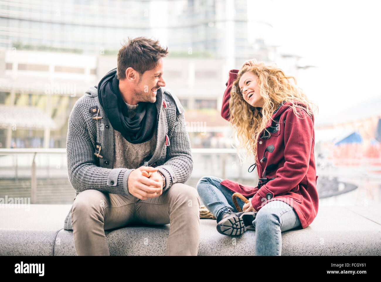 Italy Milan couple laughing together Stock Photo - Alamy