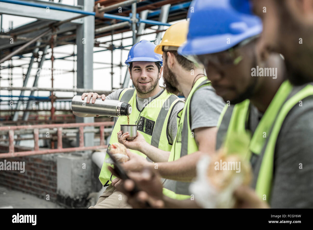 Construction workers having a break hi-res stock photography and images ...
