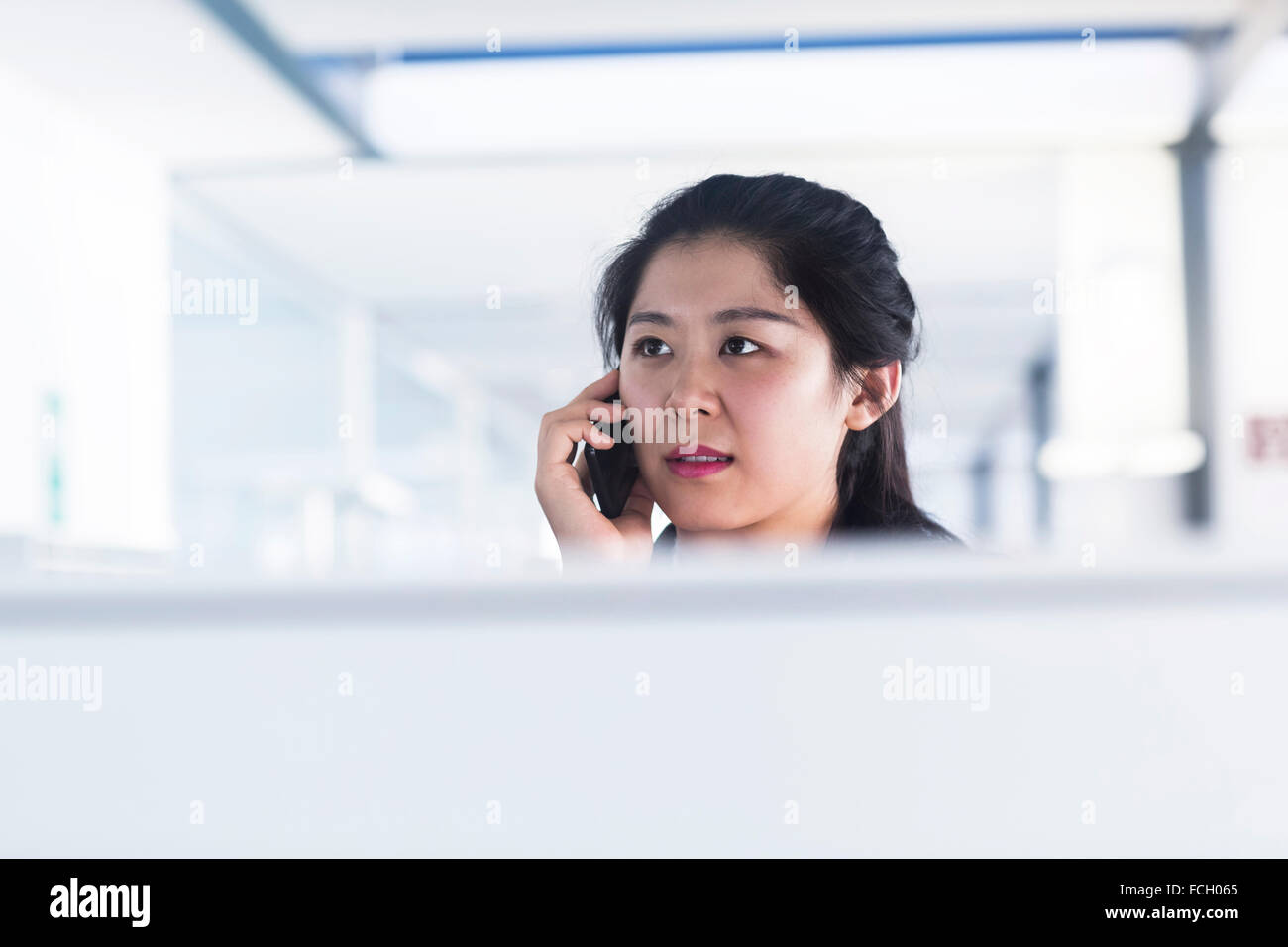 Chinese office worker working in corporate business Stock Photo - Alamy
