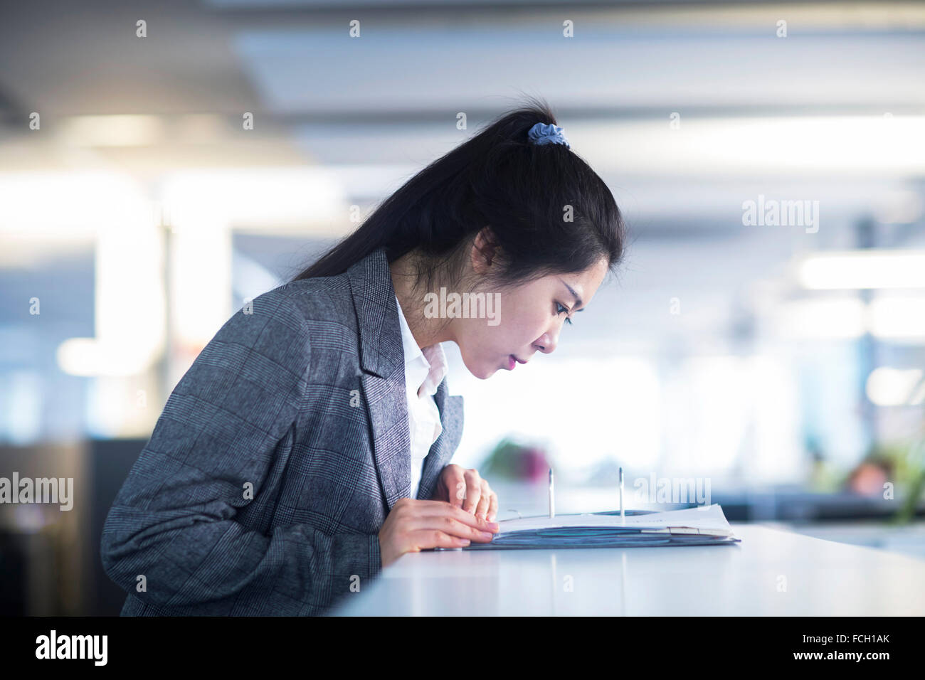 Chinese office worker working in corporate business Stock Photo - Alamy