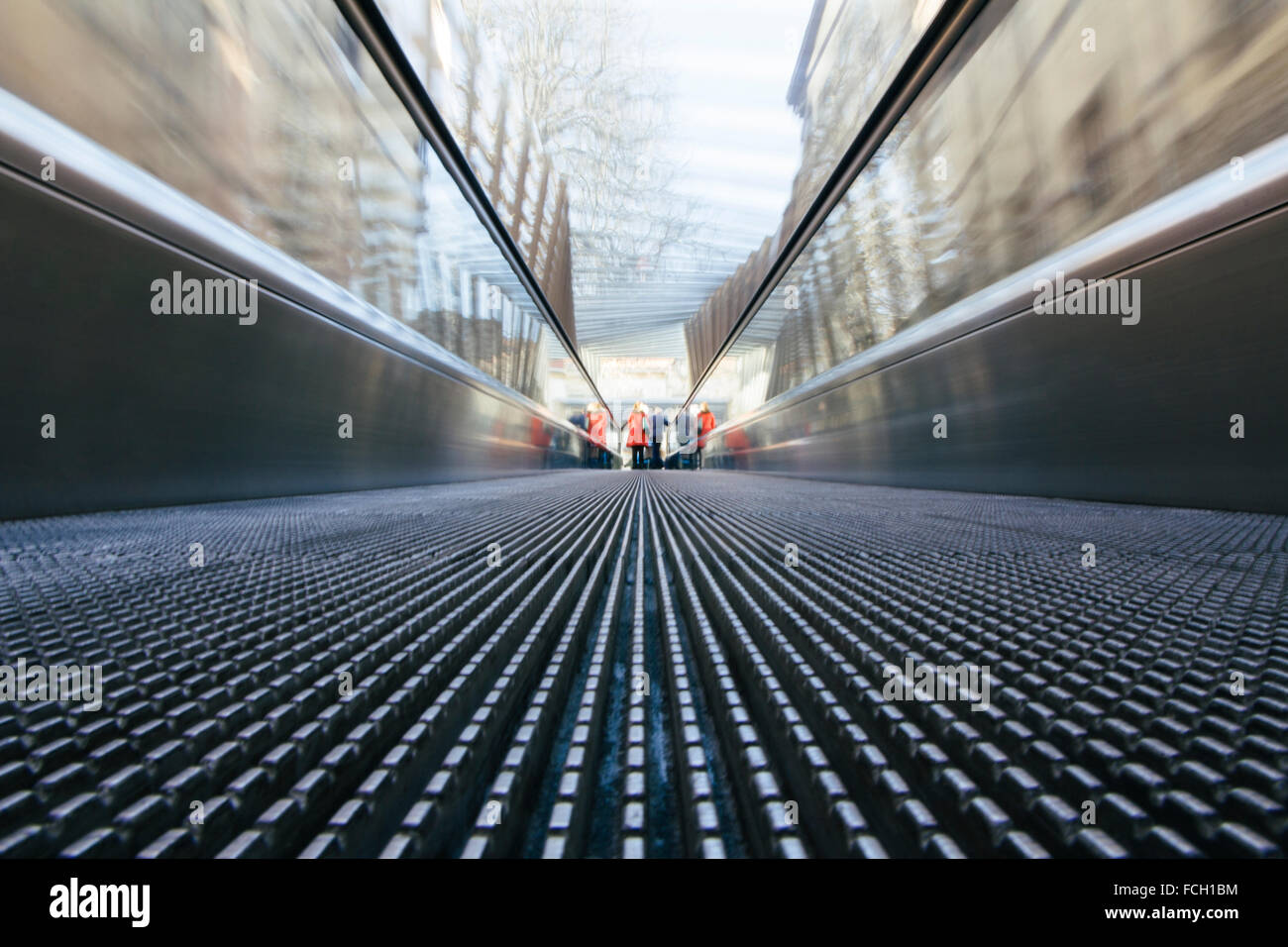 People on a moving walkway Stock Photo - Alamy