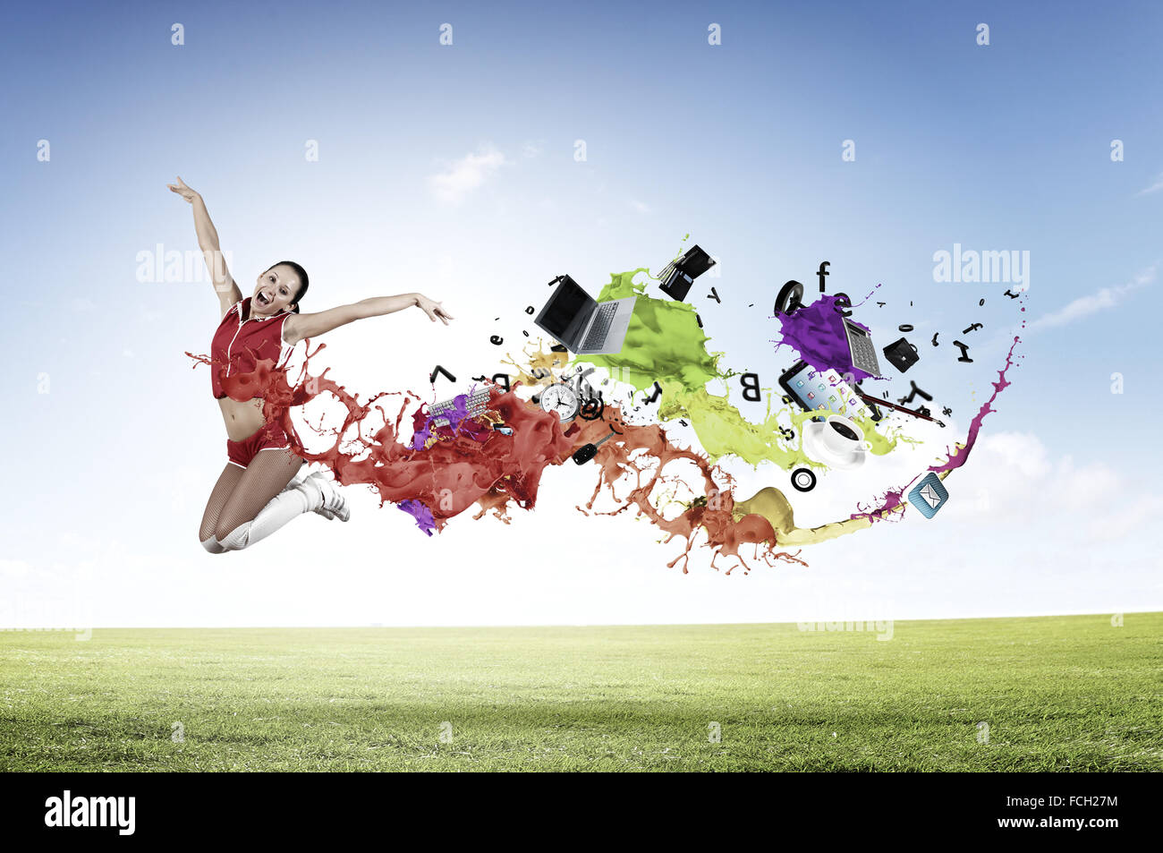 Young woman dancer in red suit jumping high Stock Photo - Alamy