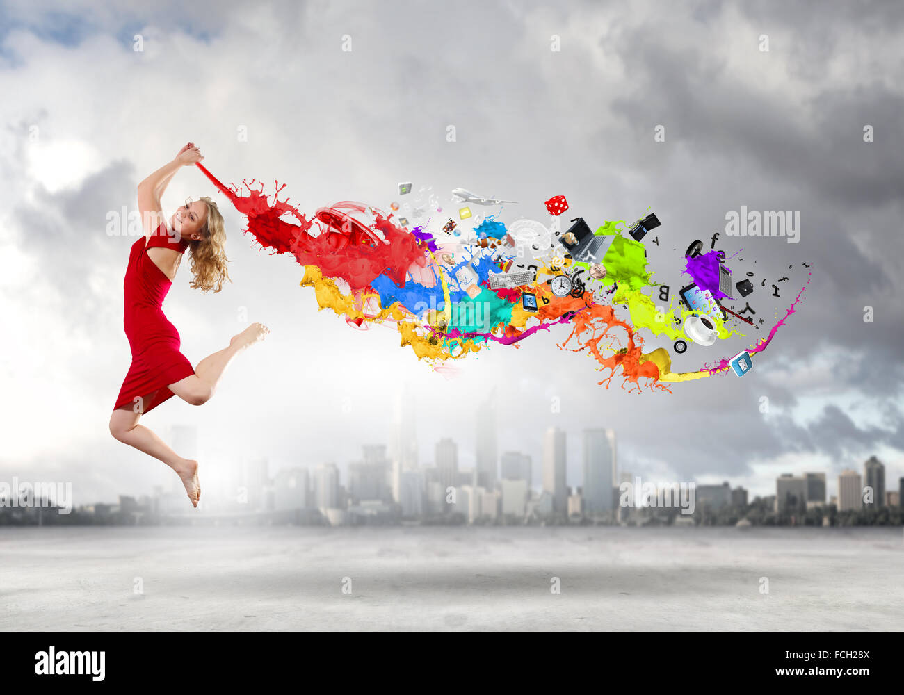Young woman dancer in red dress jumping high Stock Photo - Alamy