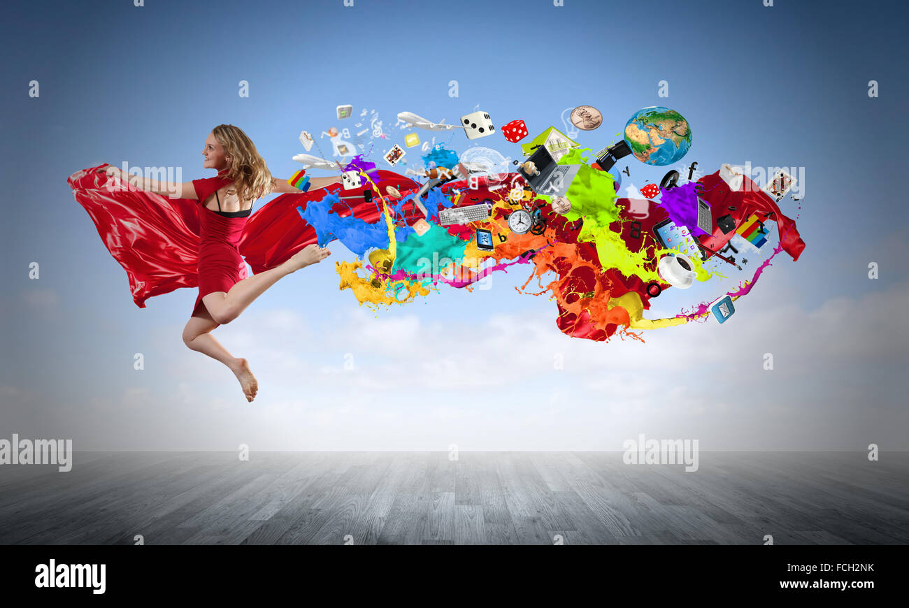 Young woman dancer in red dress jumping high Stock Photo - Alamy