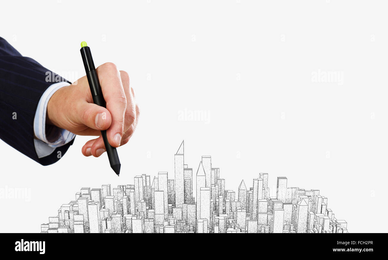 Close up of human hand drawing construction project Stock Photo - Alamy