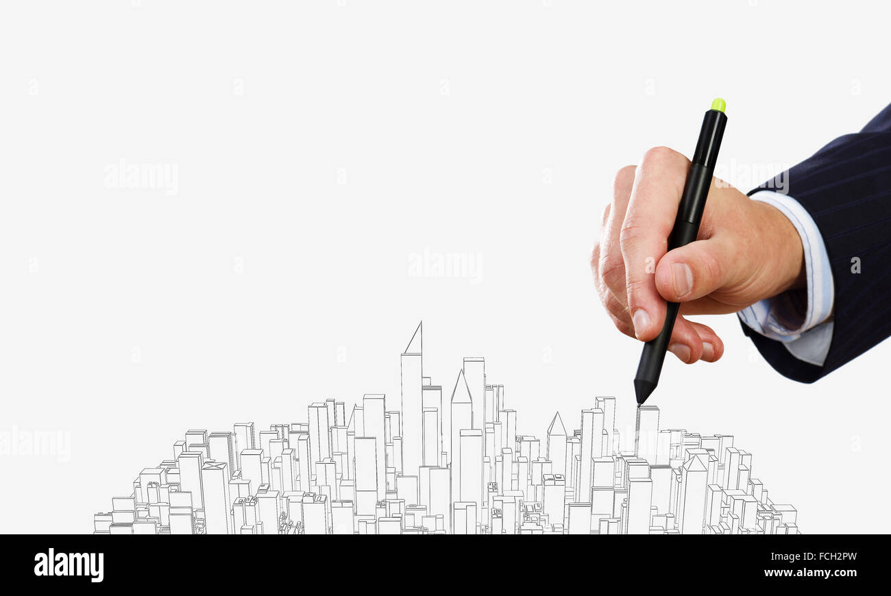 Close up of human hand drawing construction project Stock Photo - Alamy