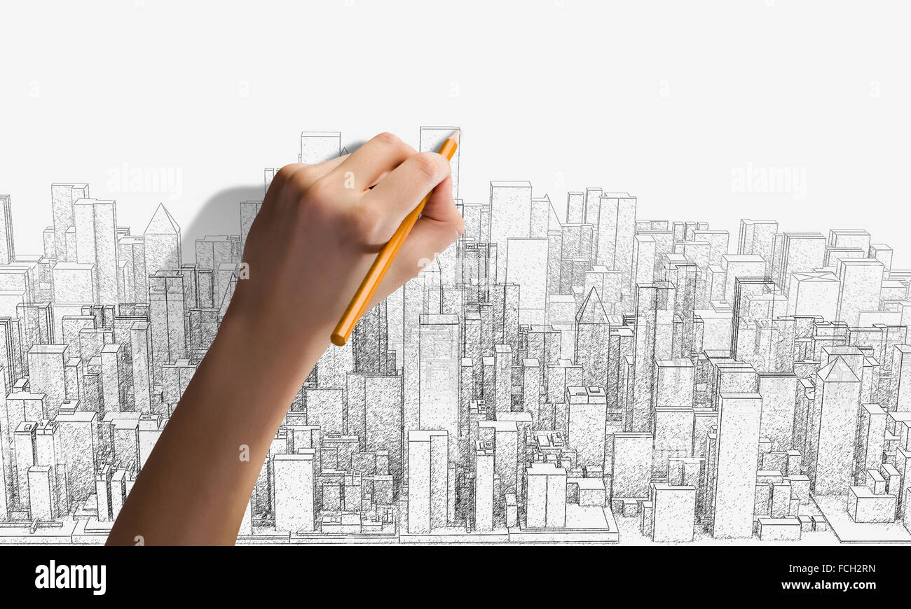 Close up of human hand drawing construction project Stock Photo - Alamy