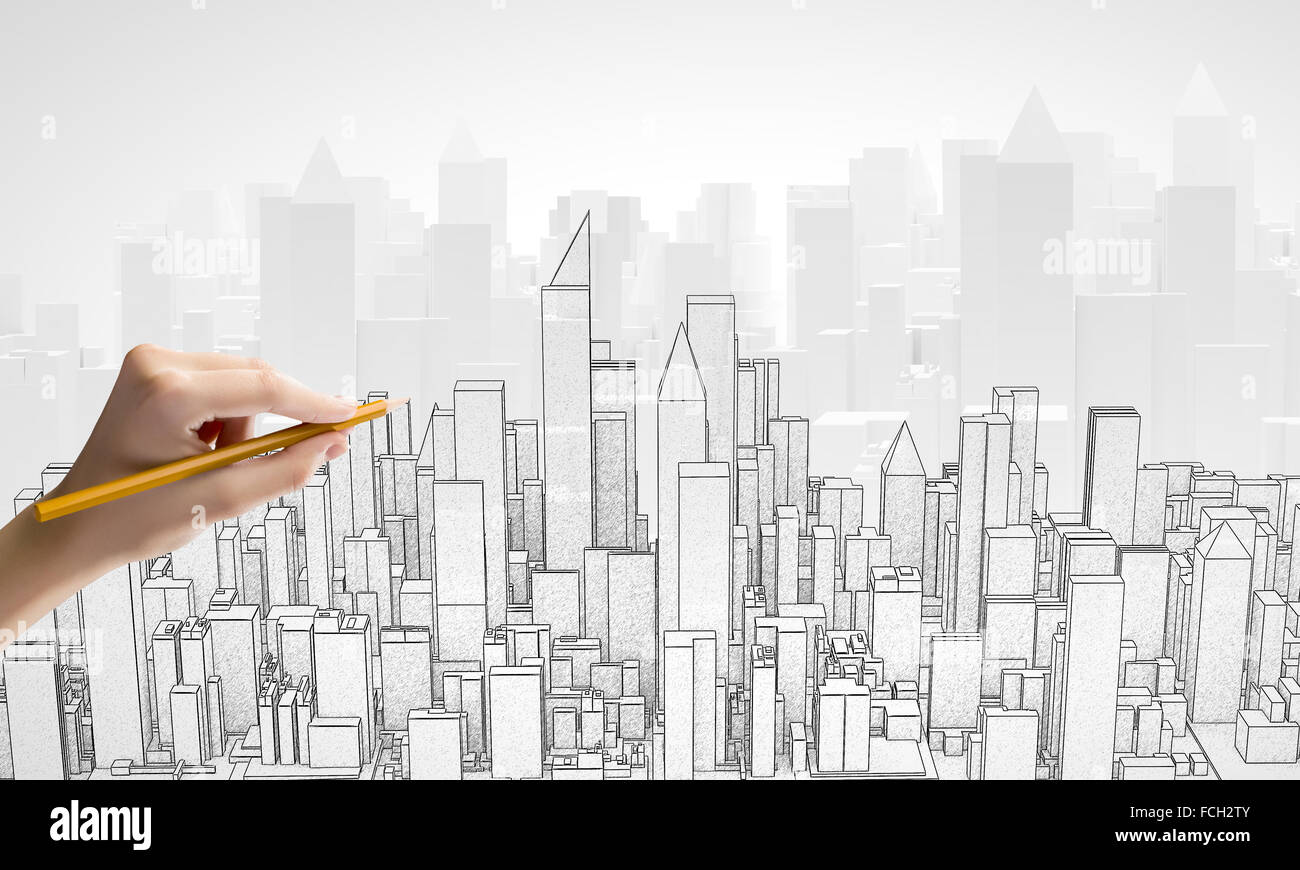 Close up of human hand drawing construction project Stock Photo - Alamy