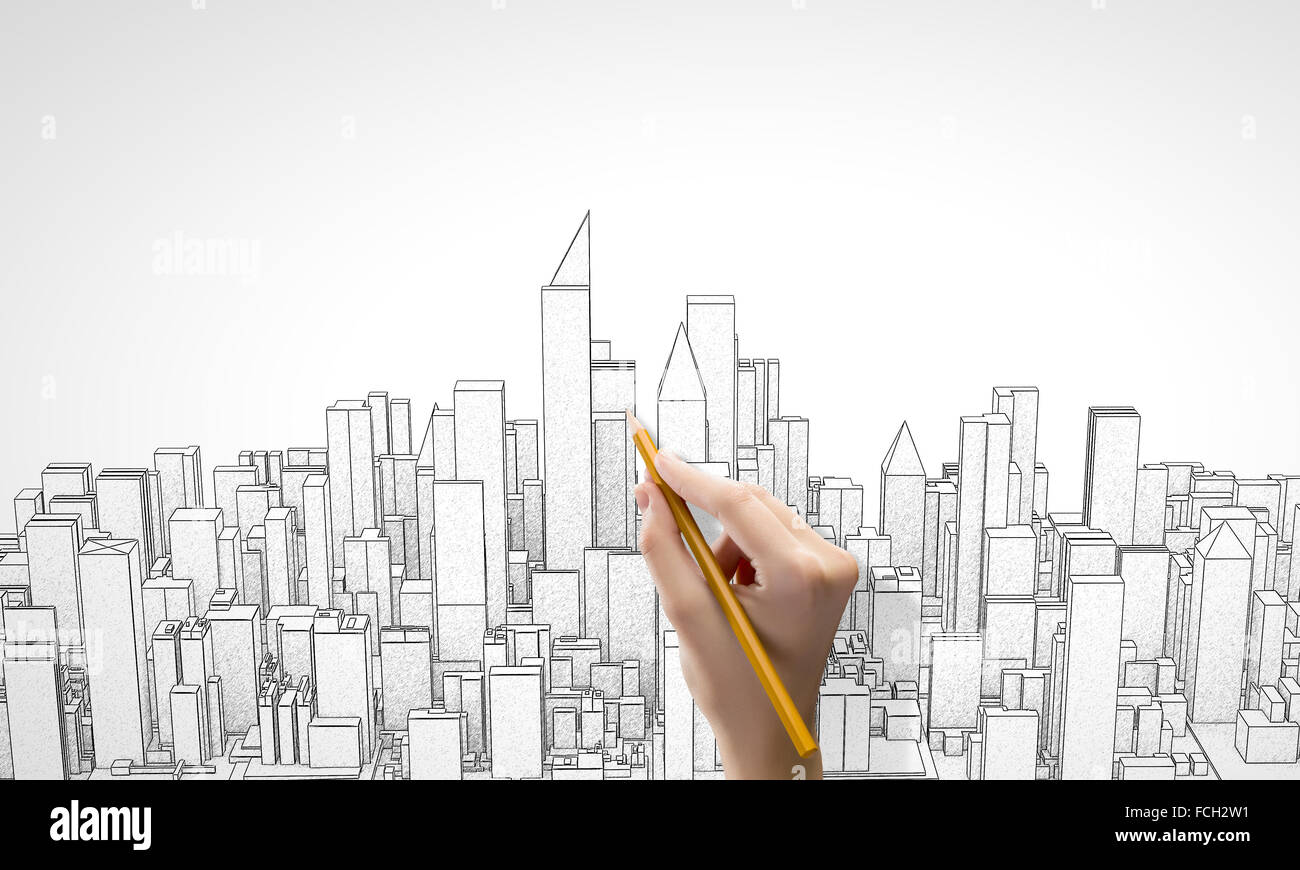 Close up of human hand drawing construction project Stock Photo - Alamy