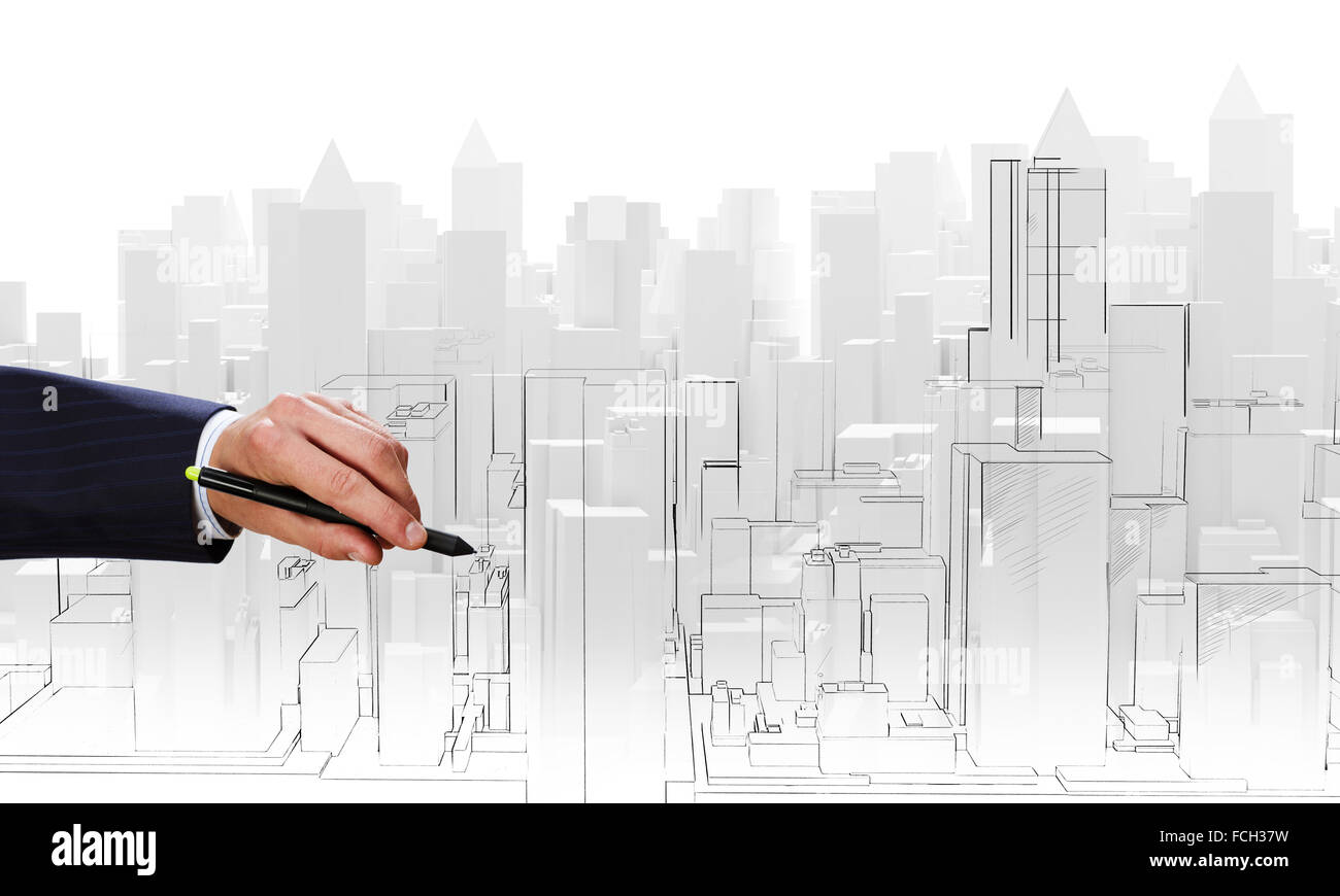 Close up of human hand drawing construction project Stock Photo - Alamy