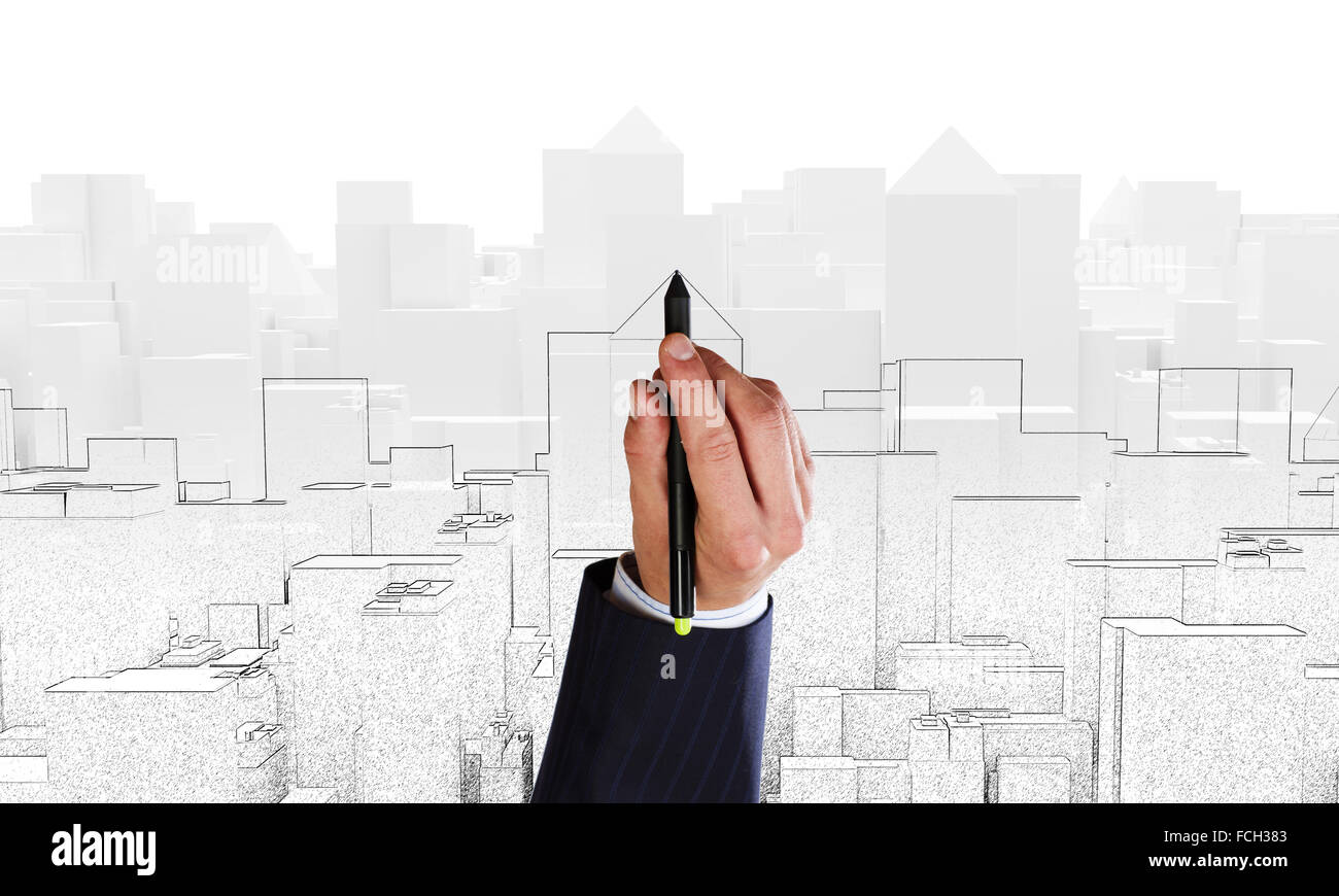Close up of human hand drawing construction project Stock Photo - Alamy