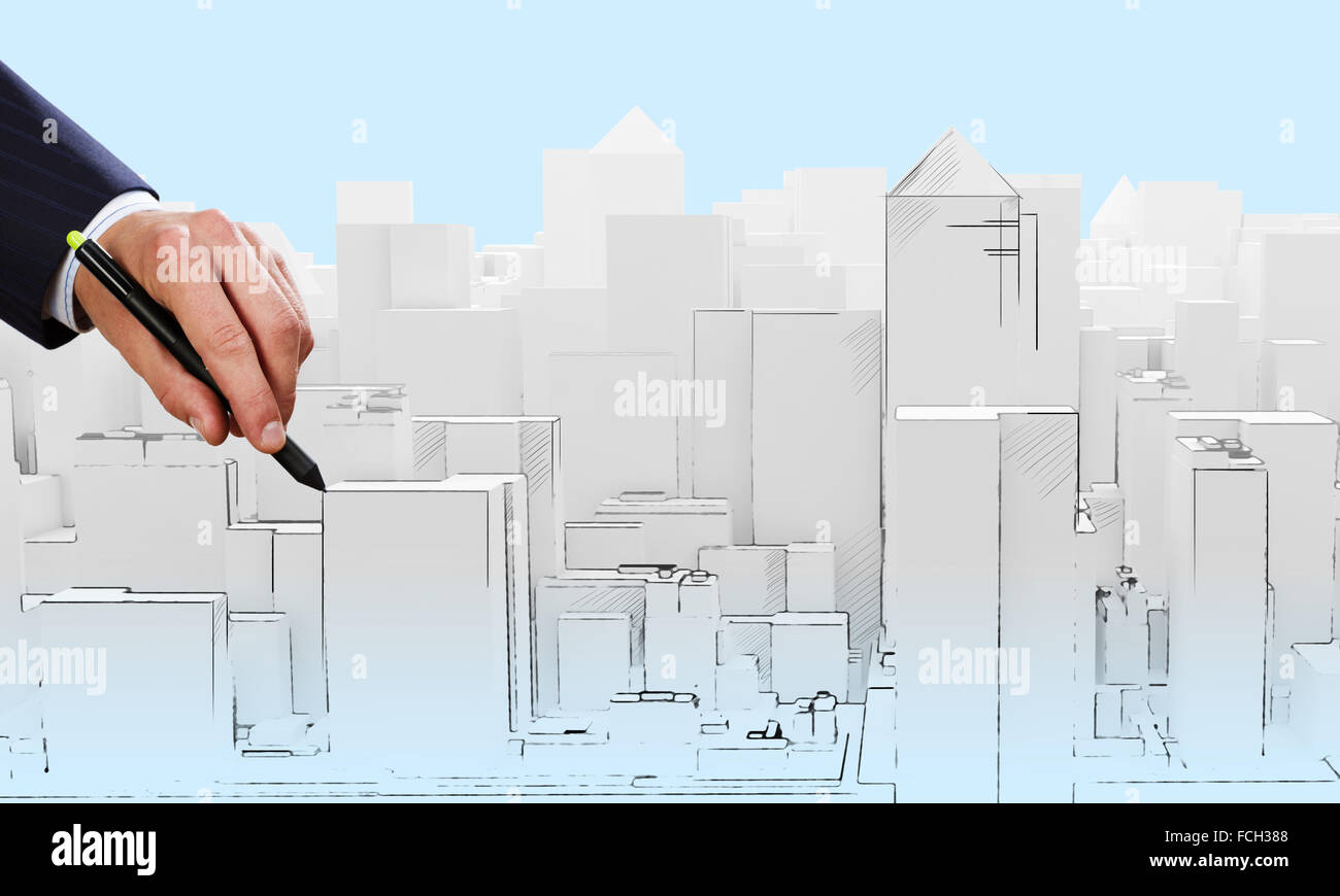 Close up of human hand drawing construction project Stock Photo - Alamy
