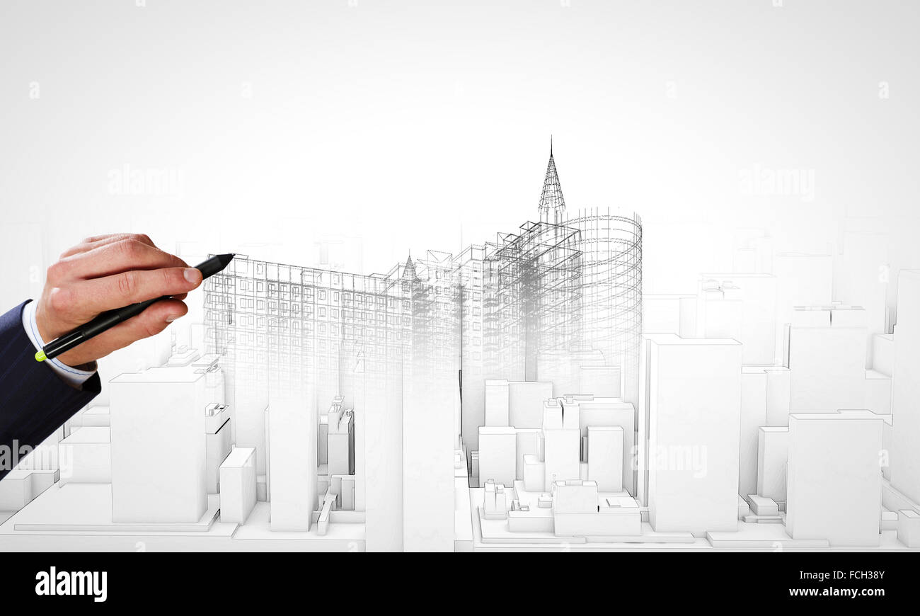 Close up of human hand drawing construction project Stock Photo - Alamy