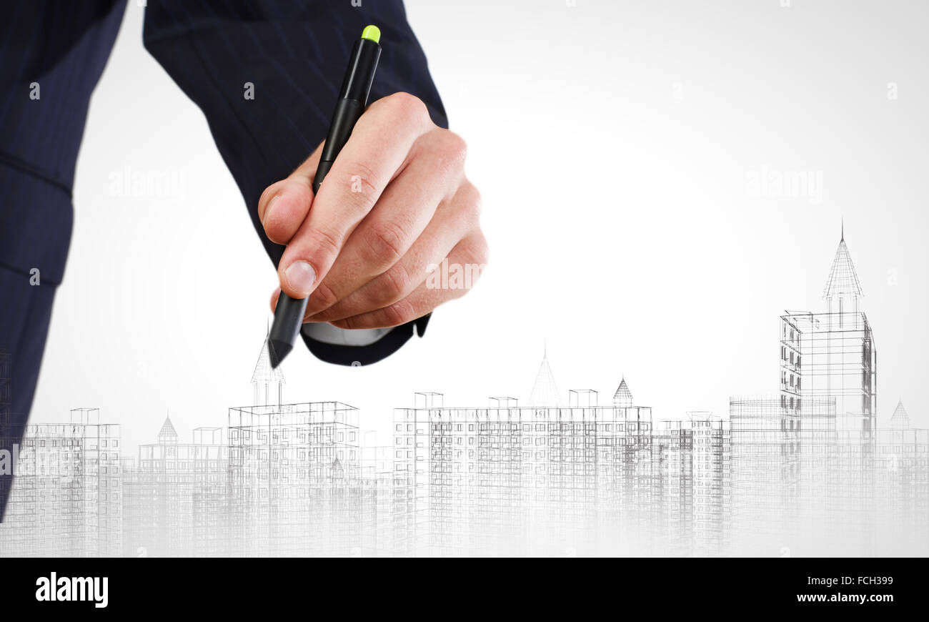 Close up of human hand drawing construction project Stock Photo - Alamy