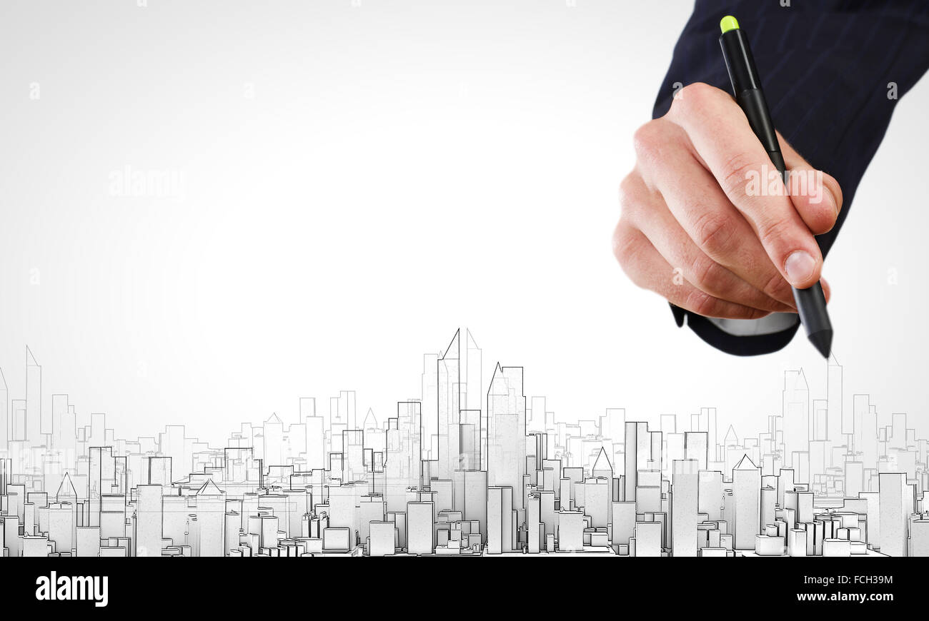 Close up of human hand drawing construction project Stock Photo - Alamy