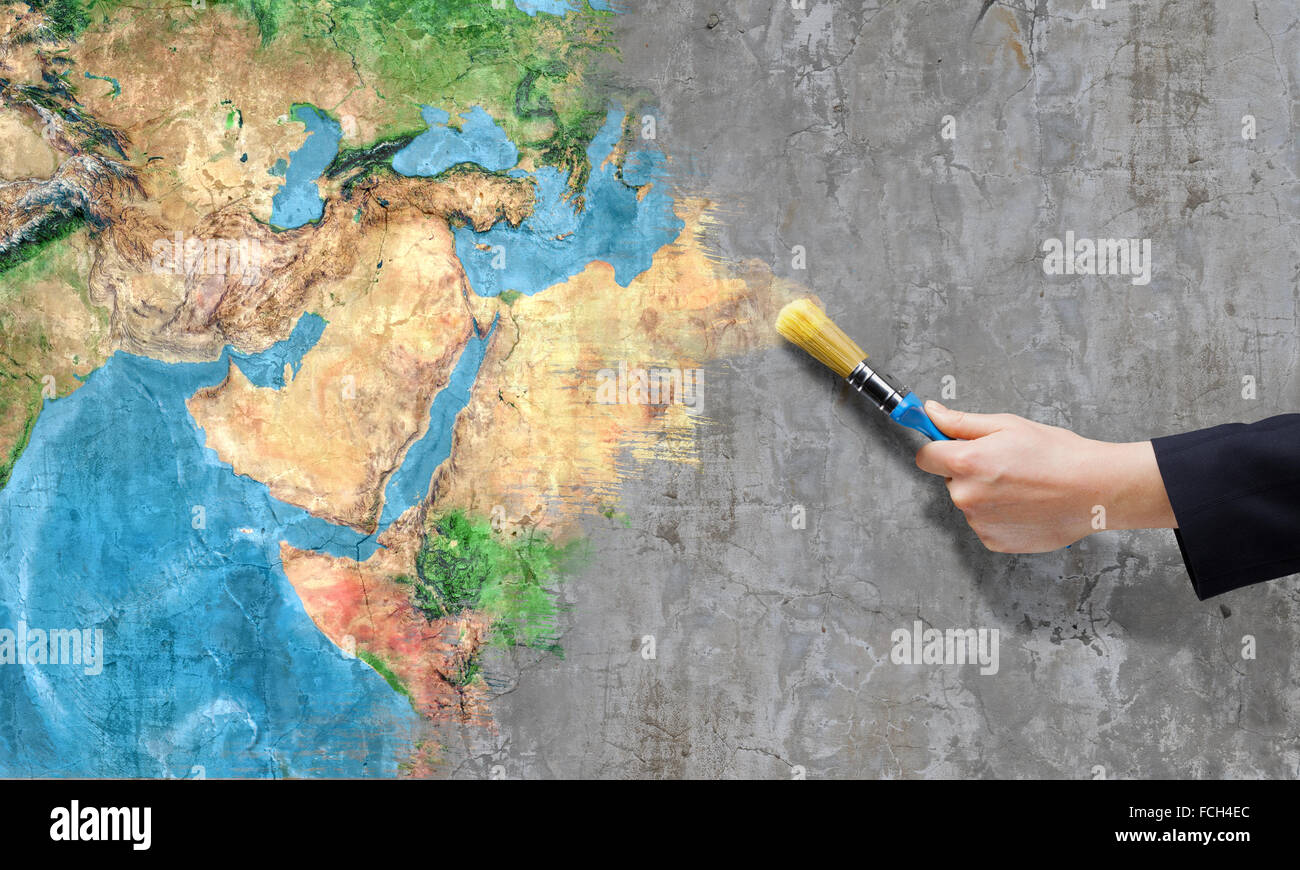 Close up of business person hand painting Earth planet. Elements of ...