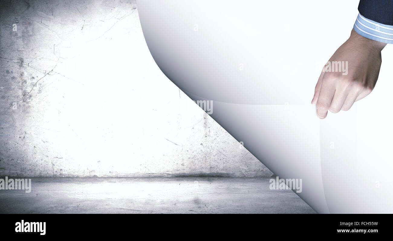 Human hand turning white blank paper page Stock Photo - Alamy