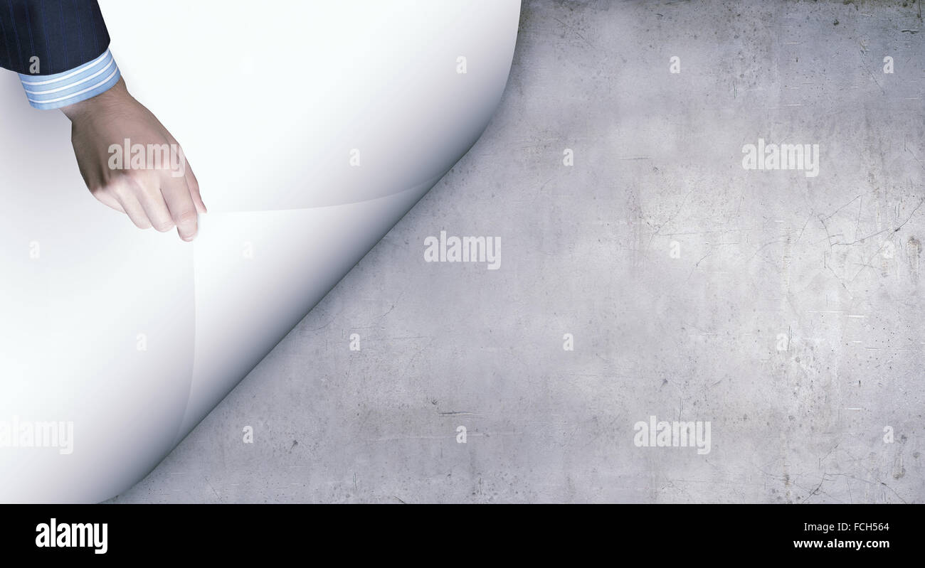 Human hand turning white blank paper page Stock Photo - Alamy