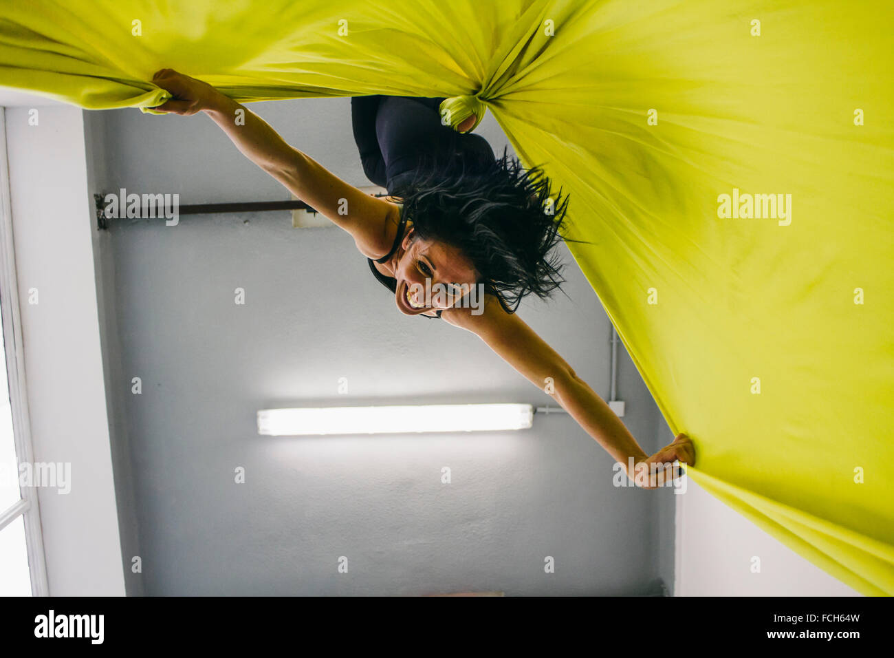 Woman hanging upside down from hi-res stock photography and images - Alamy