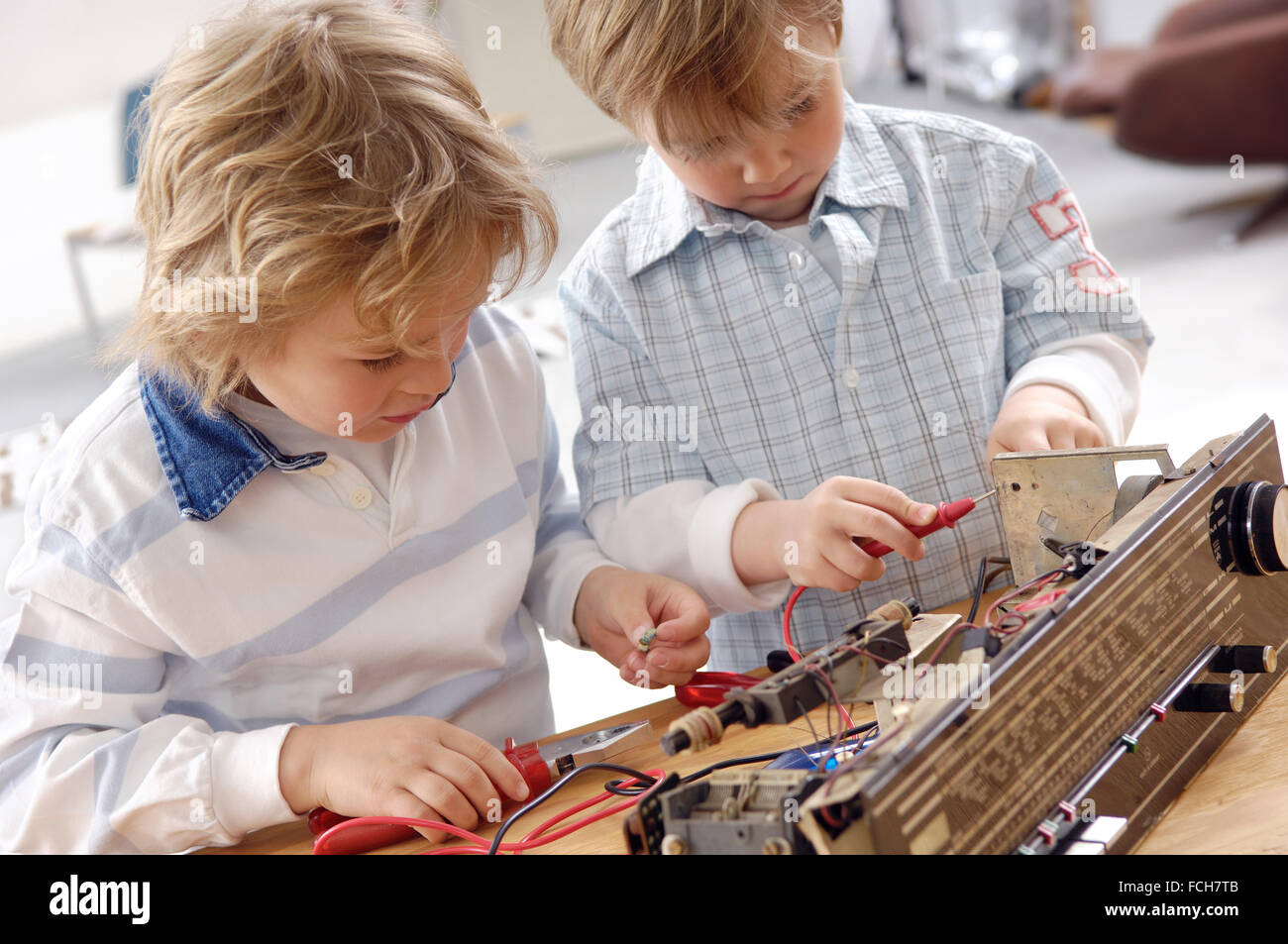 Boy disassembling hi-res stock photography and images - Alamy