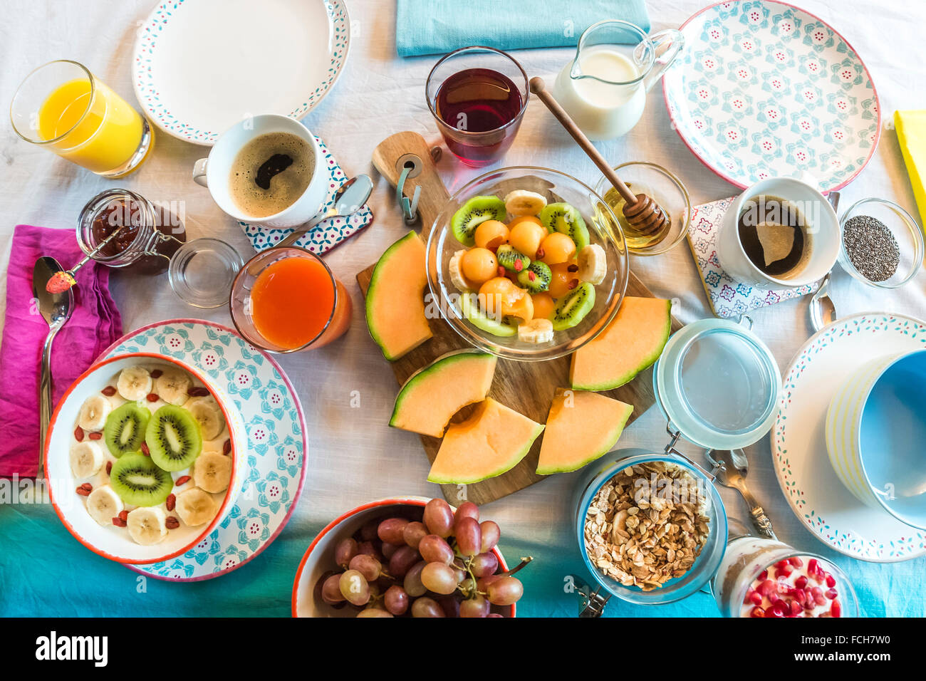 Laid breakfast table muesli and fruits Stock Photo - Alamy
